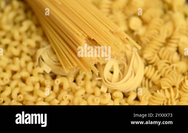 video of spinning raw Italian pasta close up Stock Video Footage - Alamy