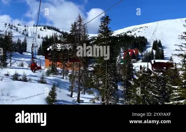 Ski lift ropeway on highland alpine mountain winter resort.Ski ...