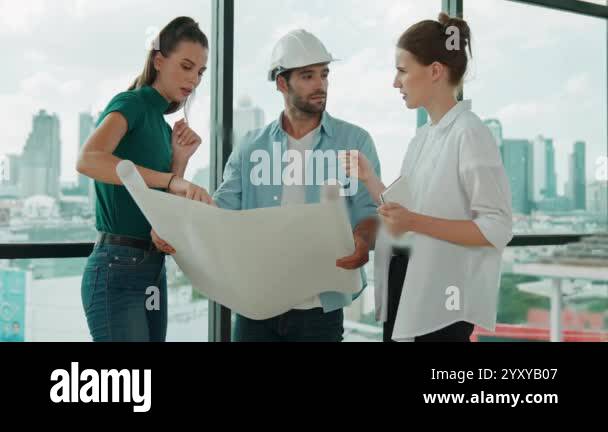 Professional architect engineer team talking, sharing, brainstorming ...