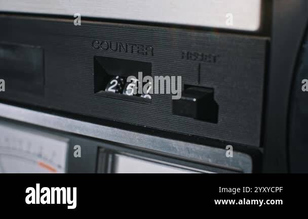 A seamless loop of a retro tape counters numbers smoothly rotating. Use ...