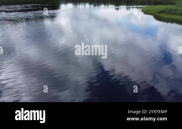 Low altitude flight over a river in Lapland, Finland Stock Video ...