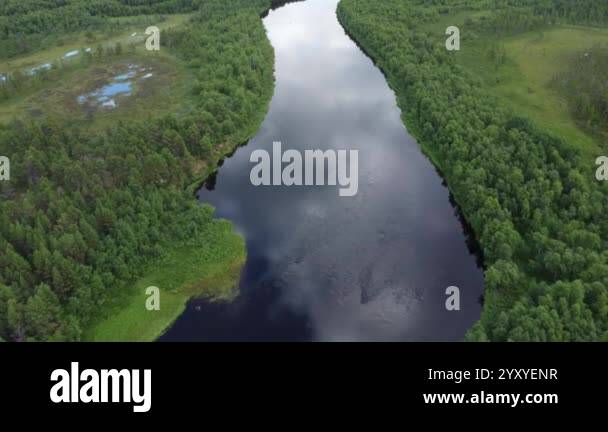 Following a meandering wilderness river in Lapland, Finland Stock Video ...