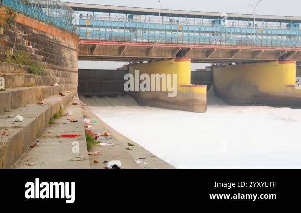 polluted river with industrial and domestic effluents toxic foam ...