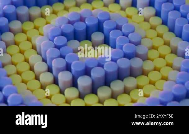 A looping 3D animation of an abstract background of many cylinders that ...