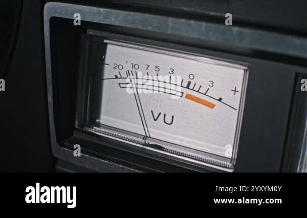 Detailed view of a vintage VU meter on a reel-to-reel tape recorder ...