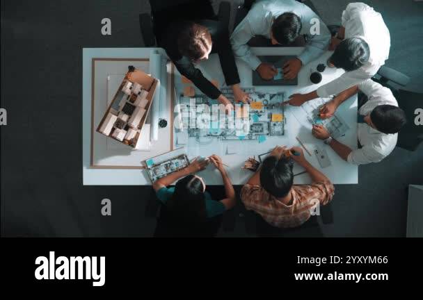 Top aerial view of project manager or civil engineer writing at ...