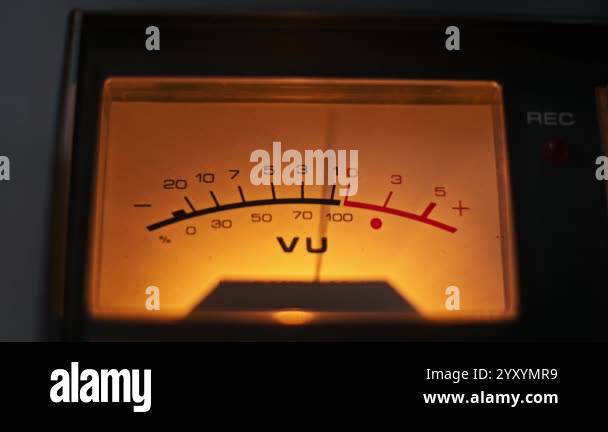 Vintage audio equipment in action, featuring a classic VU meter with a ...
