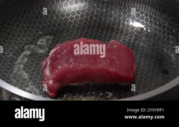 wild boar meat, close-up, cooking in a pan Stock Video Footage - Alamy