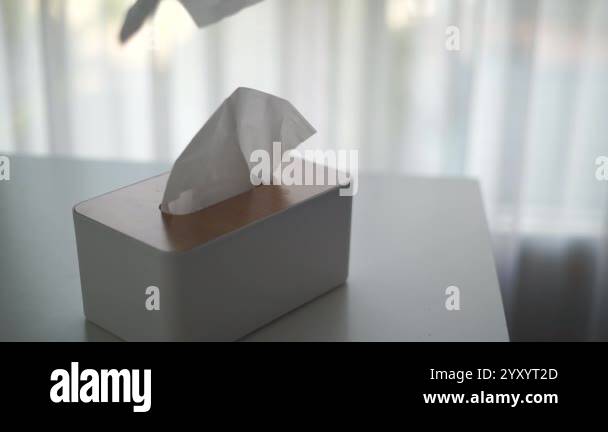 A person uses his hands to pull tissues Stock Video Footage - Alamy