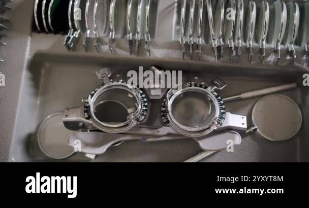 A detailed image showcasing a variety of optometry instruments ...