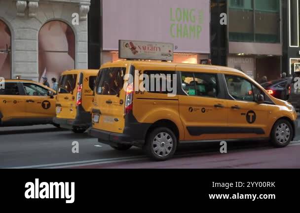 NEW YORK, USA - NOVEMBER 29, 2024: A busy street scene vividly ...
