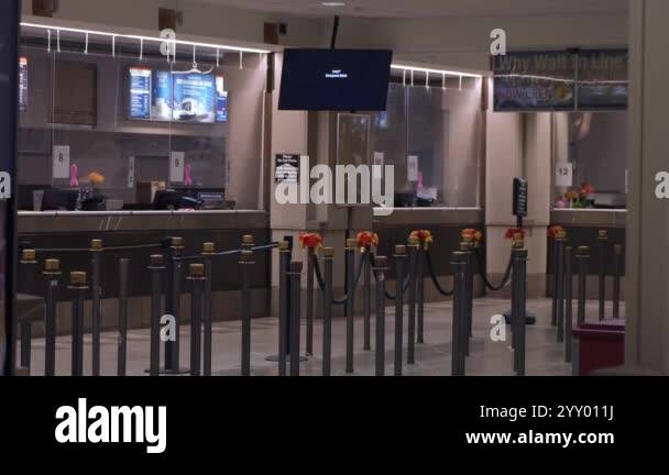 A tranquil ticket counter devoid of customers, illustrating an elegant ...