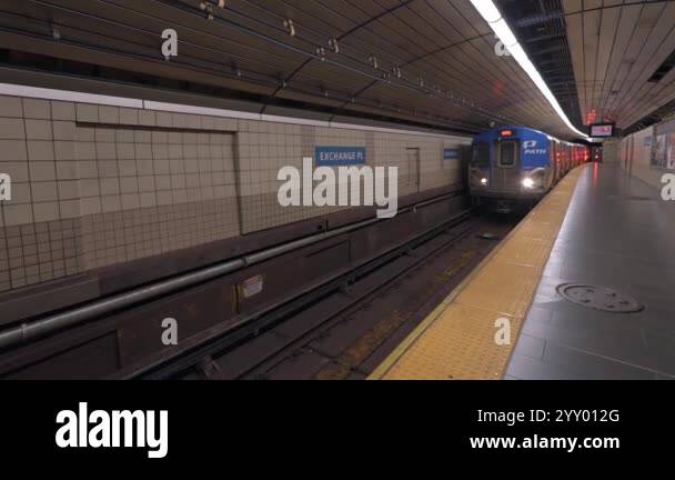 JERSEY CITY, USA - NOVEMBER 24, 2024: A subway train is approaching the ...