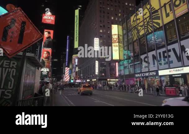 NEW YORK, USA - DECEMBER 2, 2024: A lively and bustling Times Square is ...