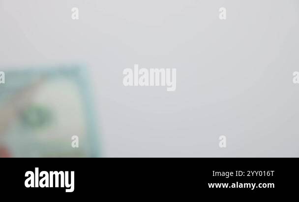 Throw a pile of 100 dollar bills on a white background. Pile of United ...