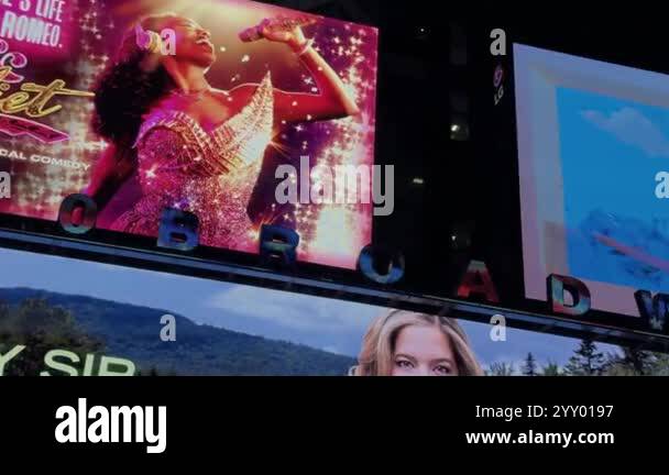 NEW YORK, USA - DECEMBER 2, 2024: Bright ads illuminate Times Square ...