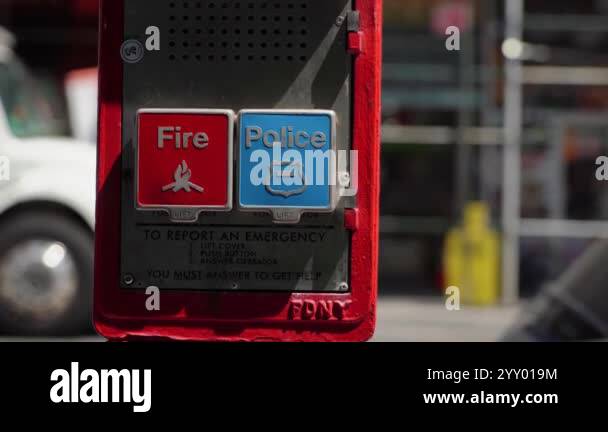 This image features a closeup view of a fire and police emergency call ...