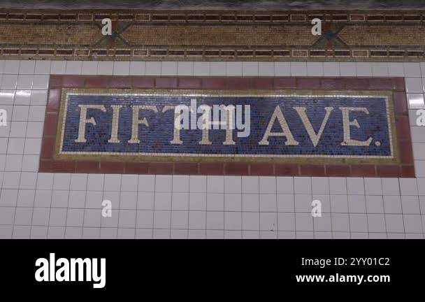 A stunning and intricate tile mosaic sign at the Fifth Avenue subway ...