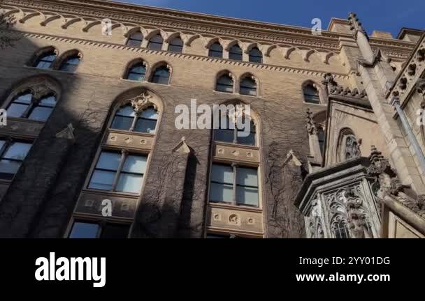 The stunning gothic architecture showcases intricate windows and ...