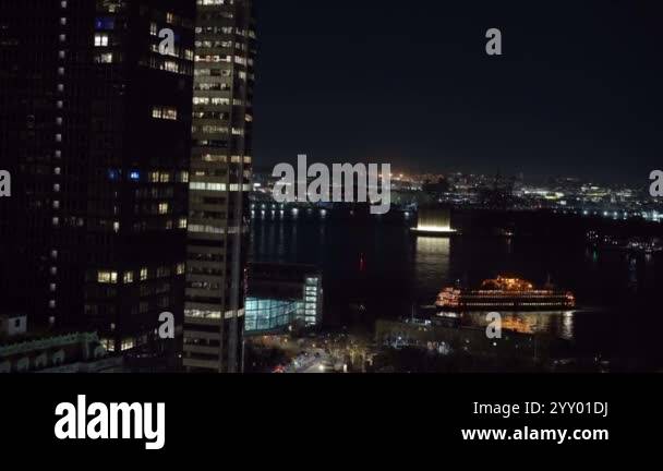 An enchanting and serene nighttime view of a vibrant cityscape ...