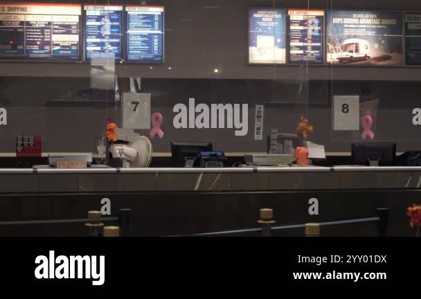 NEW YORK, USA - NOVEMBER 30, 2024: An extensive empty airport checkin ...
