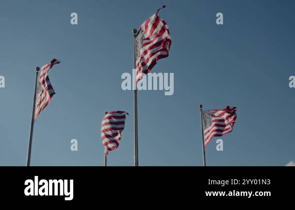A magnificent and stunning array of American flags is waving proudly ...