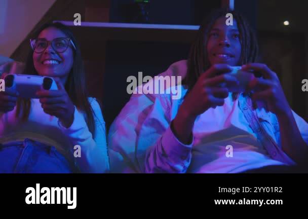 Influencer gamer couple playing games with joystick live streaming on ...