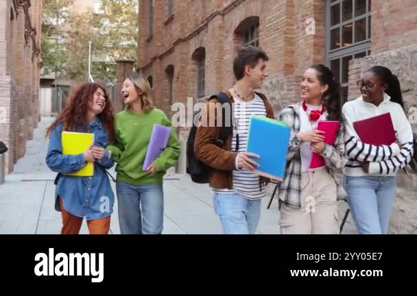 Group of high school friends, walking and talking together at ...