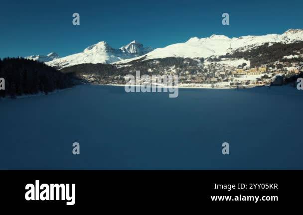 Aerial view over St. Moritz, Switzerland during winter with snow ...