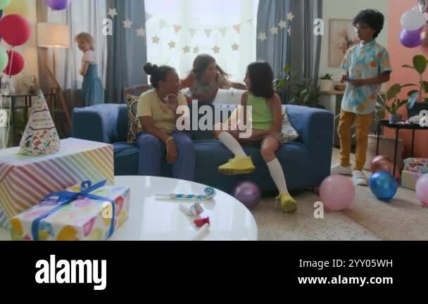 Boy inviting two friends to play with balloons, they agreeing and ...