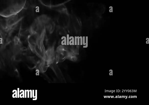 White natural steam or smoke rising across the entire width of the ...