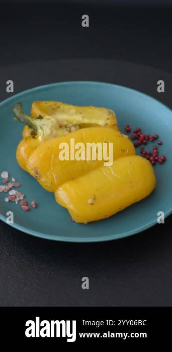 Yellow sweet pepper cut in half and grilled with salt, spices and herbs ...