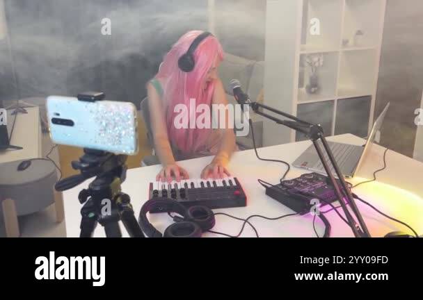 Beautiful young singer and modern musician broadcast from her home ...