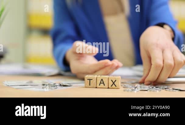 An image depicting tax preparation activities in a professional office ...