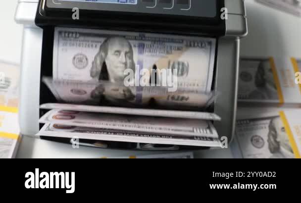 Currency cash counting machine counts dollar notes with accuracy. Money ...