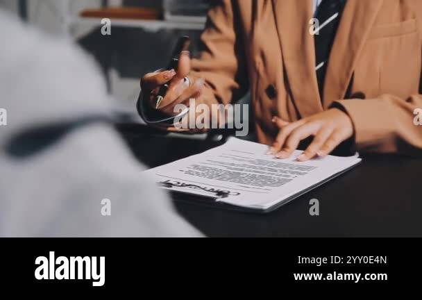 close up of a female hand signing a contract to seal a contract Stock ...