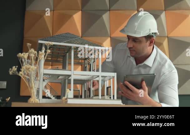 Closeup of professional caucasian male architect engineer inspect and ...