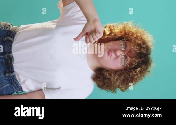 Vertical video. Dislike gesture. Negative feedback. Disgusted ...