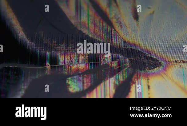 Crackled screen. Matrix damage. Rainbow distortion of computer display ...