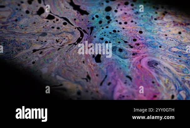 Oil stains. Ethereal art background. Defocused multicolor purple green ...