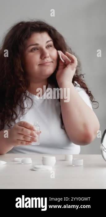 Vertical video. Face cleansing. Skin care. Freshness beauty. Overweight ...