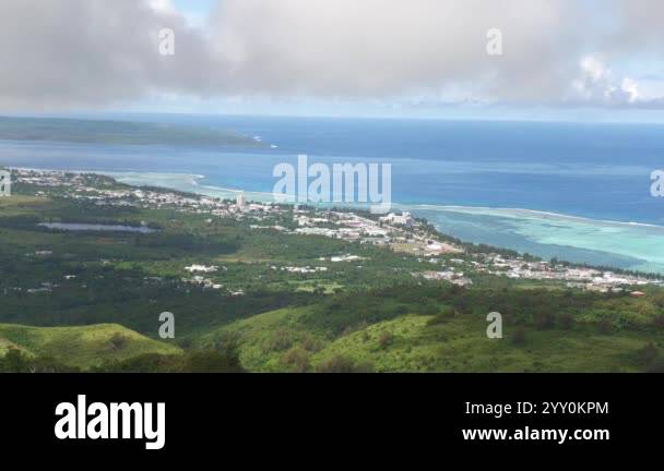 Aerial footage of Saipan, with Lake Susupe and Tinian island in the ...