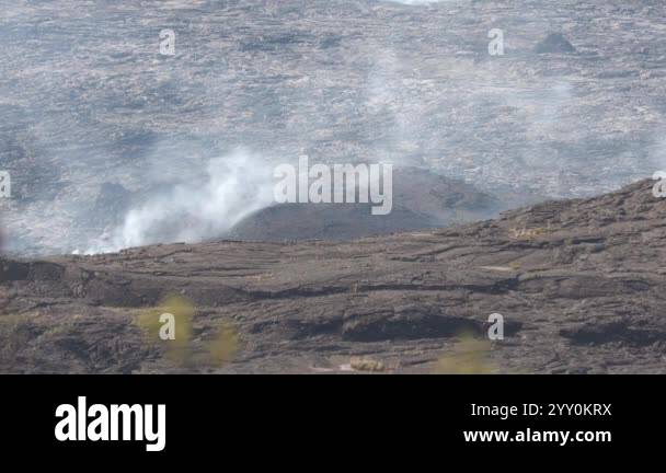 Steam rising out of Klauea volcano several days after an eruption ...