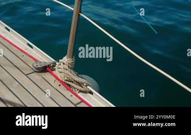 Rope prevents vessel from swaying too much with waves. Rope tied ...