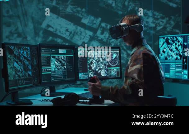 Dramatic scene of a soldier in a dimly lit military control room ...