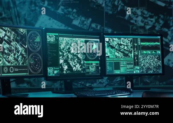 Dramatic scene of a soldier in a dimly lit military control room ...