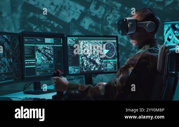 Dramatic scene of a soldier in a dimly lit military control room ...