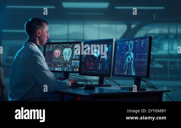 Doctor working at futuristic office, multiple monitors displaying ...