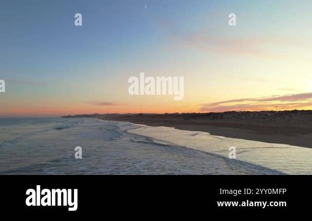 sunset on the beach Stock Video Footage - Alamy