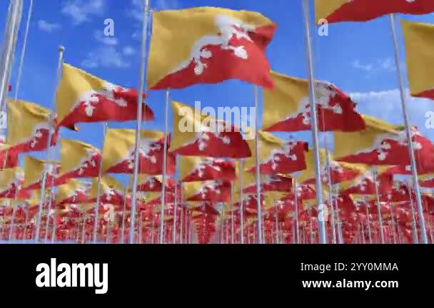 Fluttering Bhutan flags on blue sky background. Prosperity concept. The ...